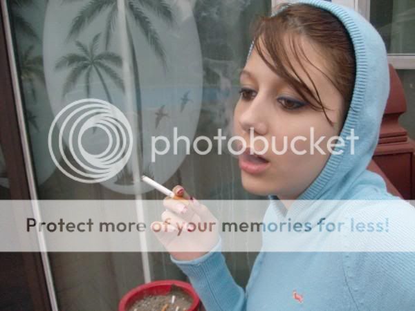 Exhales - Kitty Lynn Smoking Fetish - Now smoking 5 packs a day!