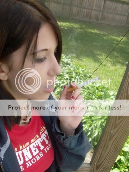 Exhales - Kitty Lynn Smoking Fetish - Now smoking 5 packs a day!